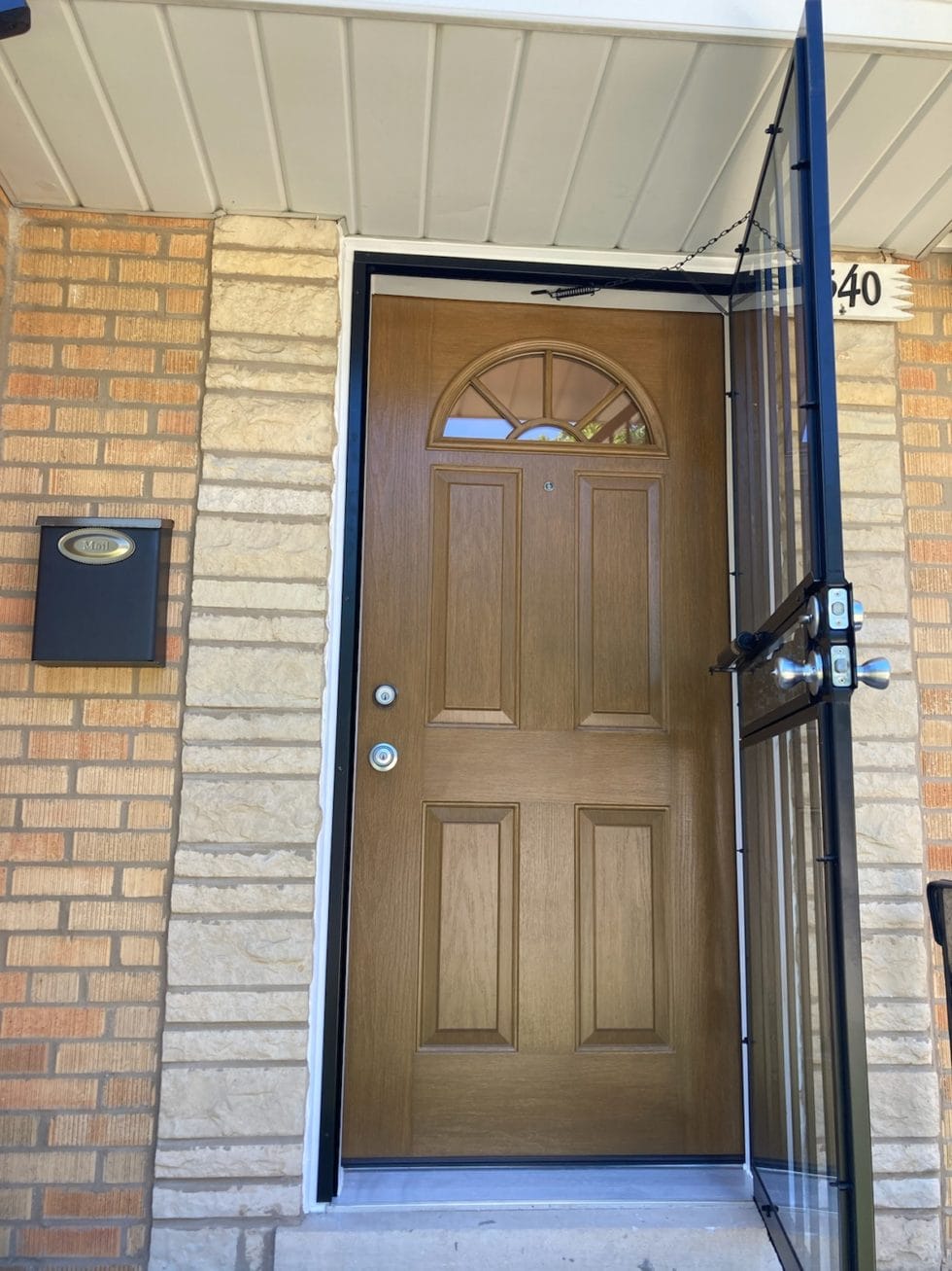 Harvest Gold Woodgrain Steel Entry And Security Storm Door Defender ...